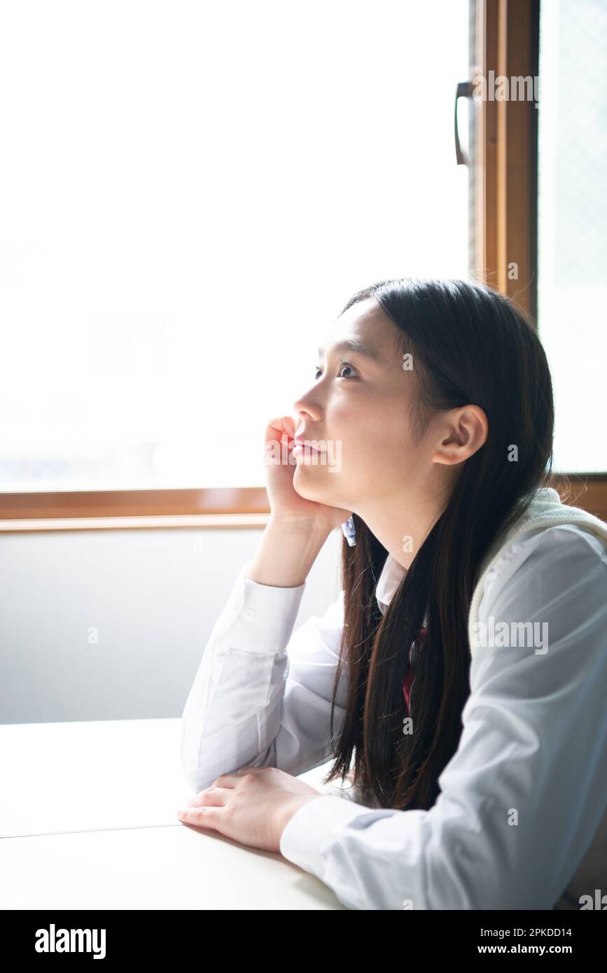 School girl thinking hi-res stock photography and images - Alamy