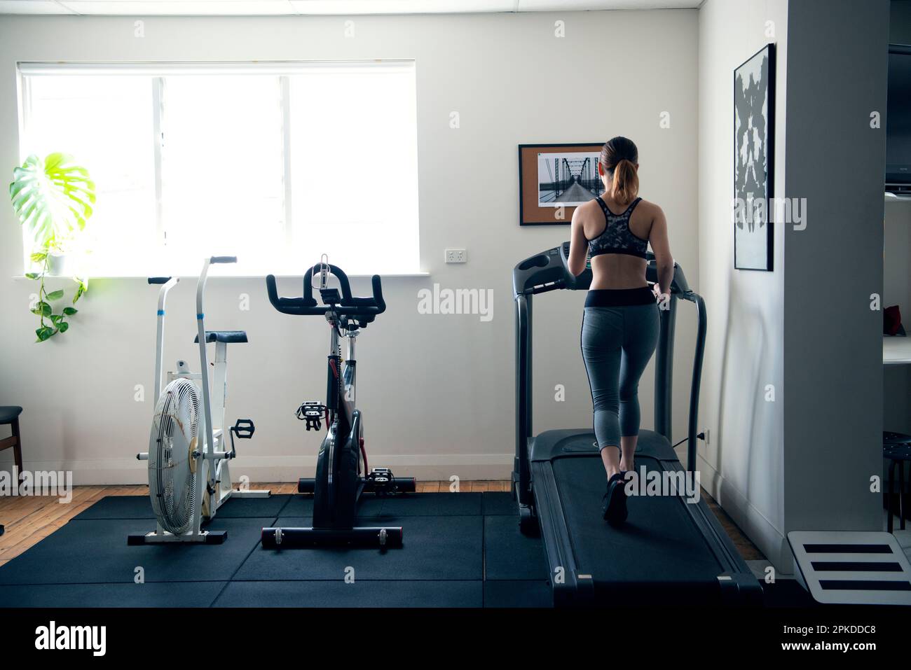 Woman and running machine hi-res stock photography and images - Alamy