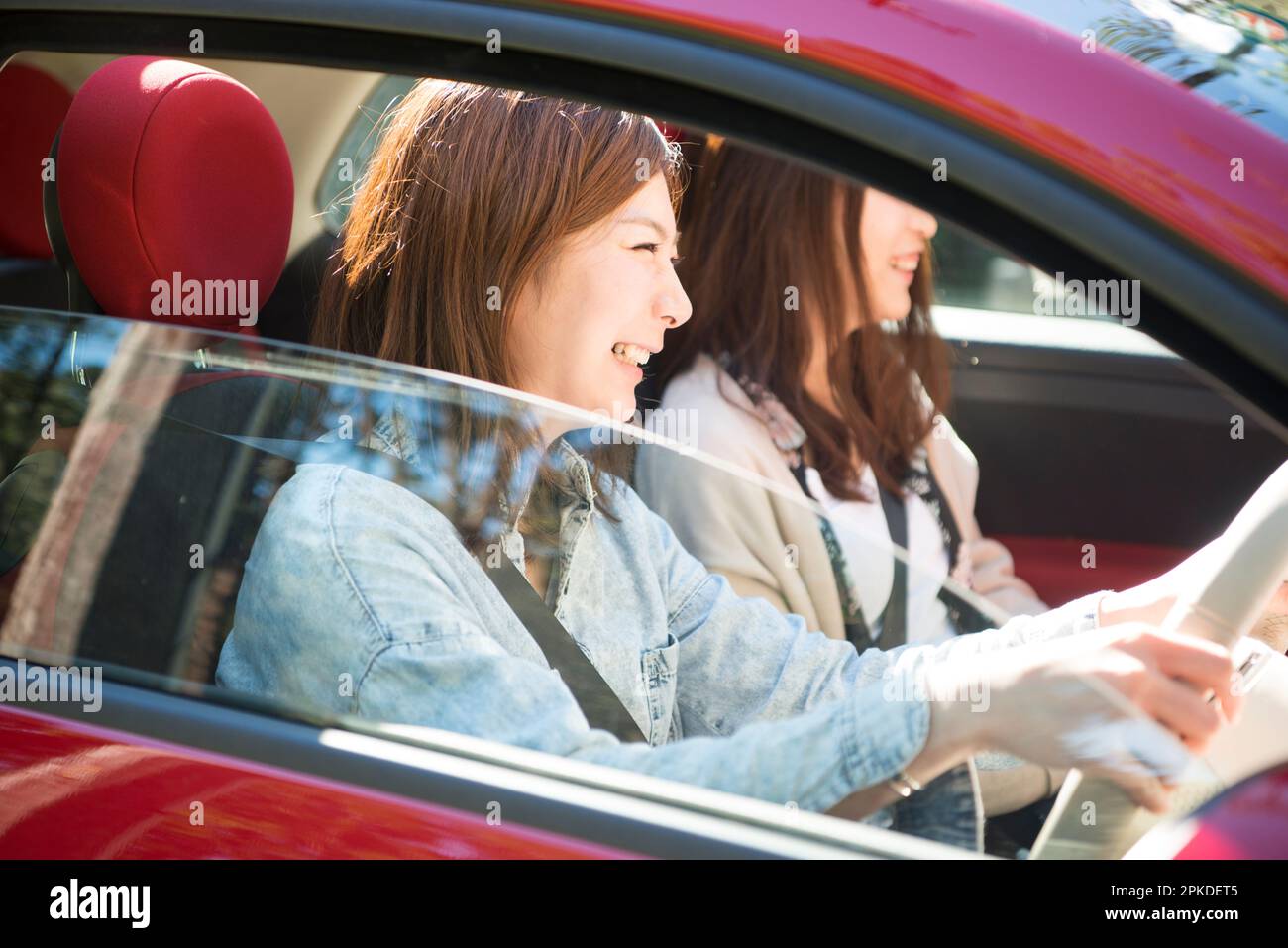 2 women enjoying a drive Stock Photo - Alamy