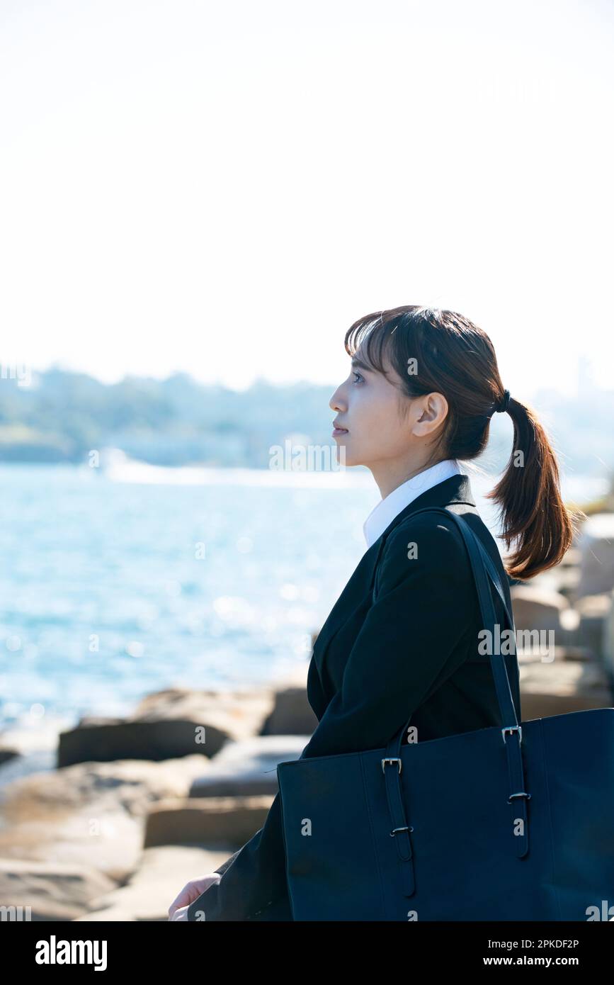 Person looking at the sea hi-res stock photography and images - Alamy