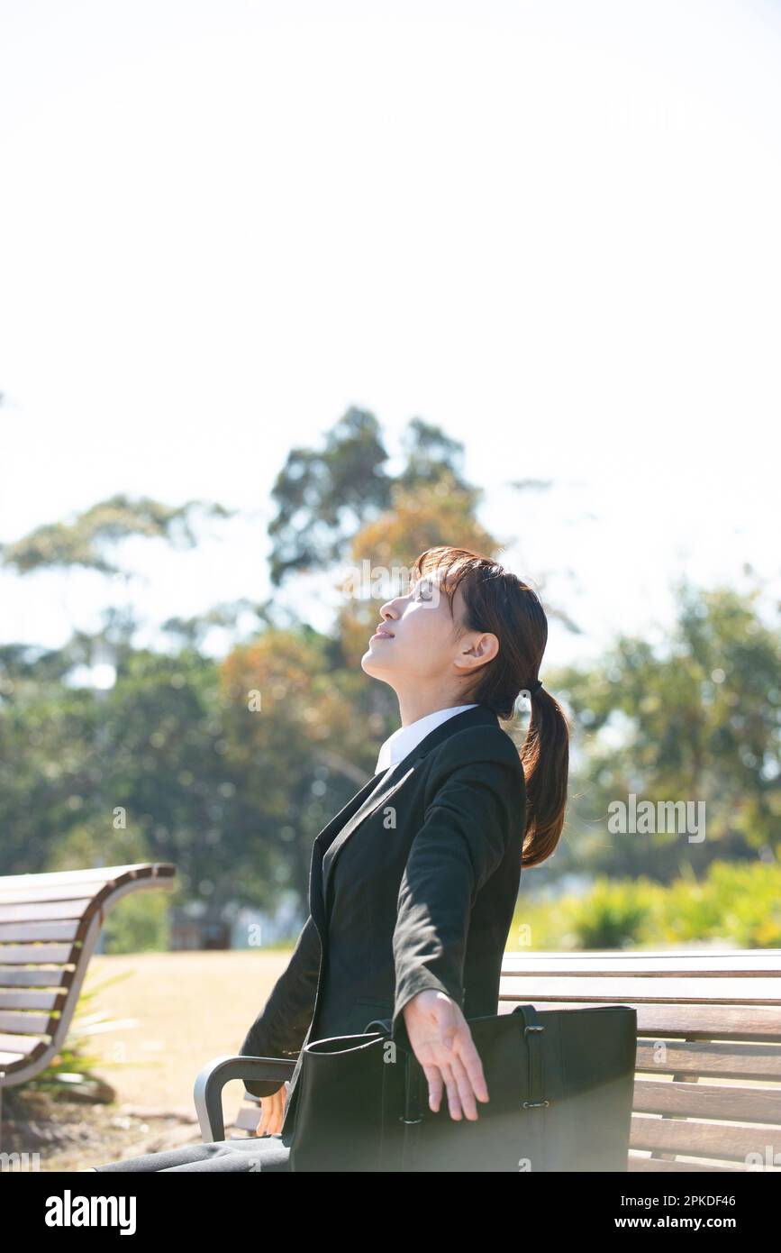 Woman taking deep breath hi-res stock photography and images - Alamy