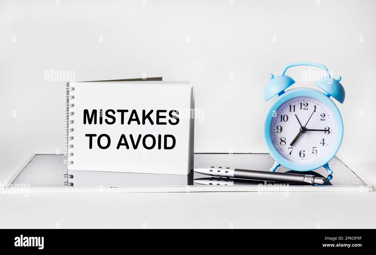 Notepad with text Mistakes To Avoid with clock and pen. Can be used as ... Notepad with text Mistakes To Avoid with clock and pen. Can be used as ...