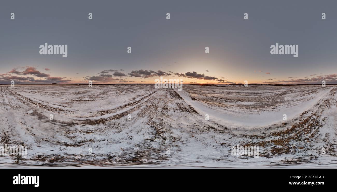evening 360 hdri panorama on farming field with snow and dark blue sky ...
