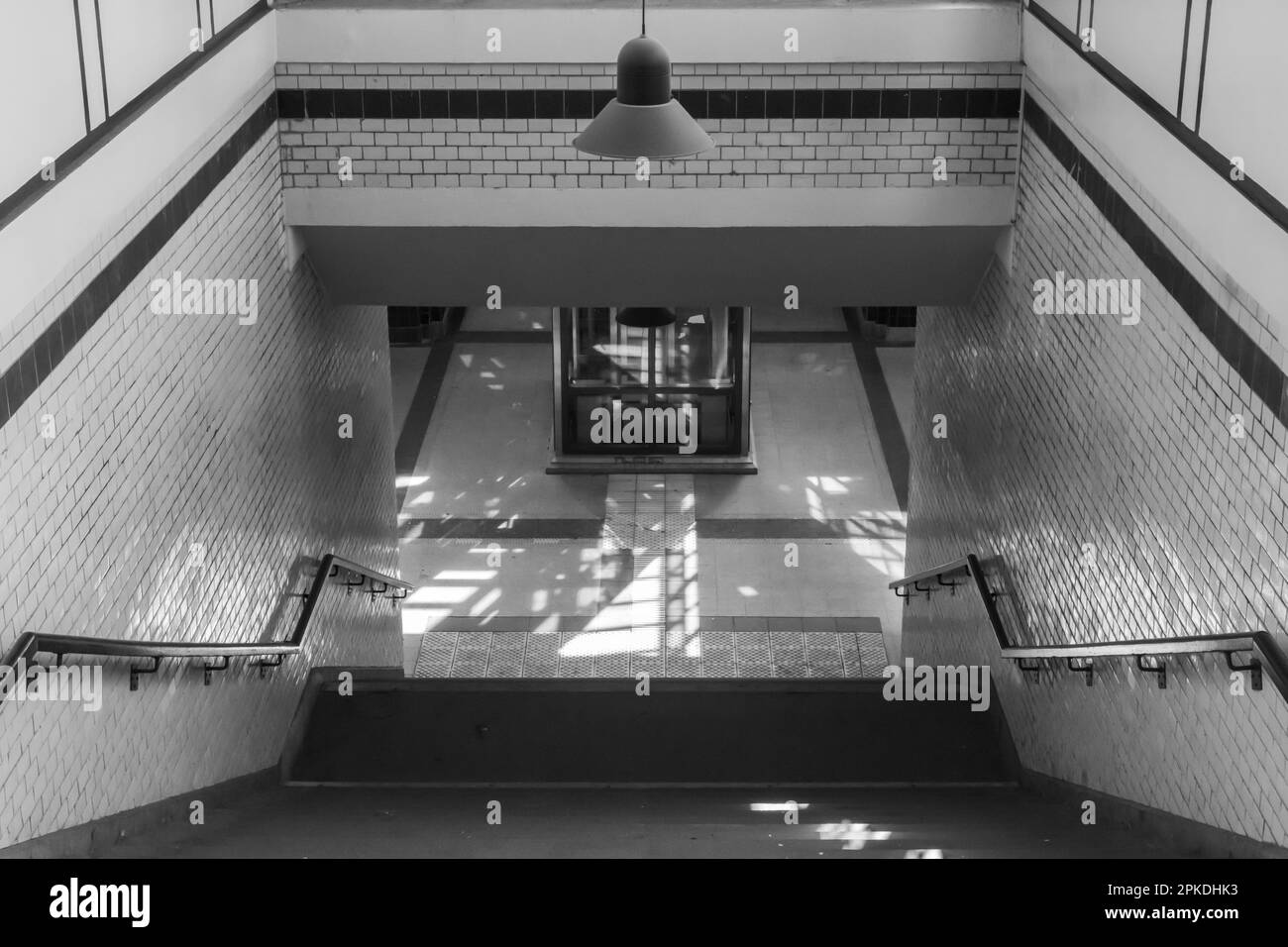 Stairs down into an old entrance hall Stock Photo - Alamy