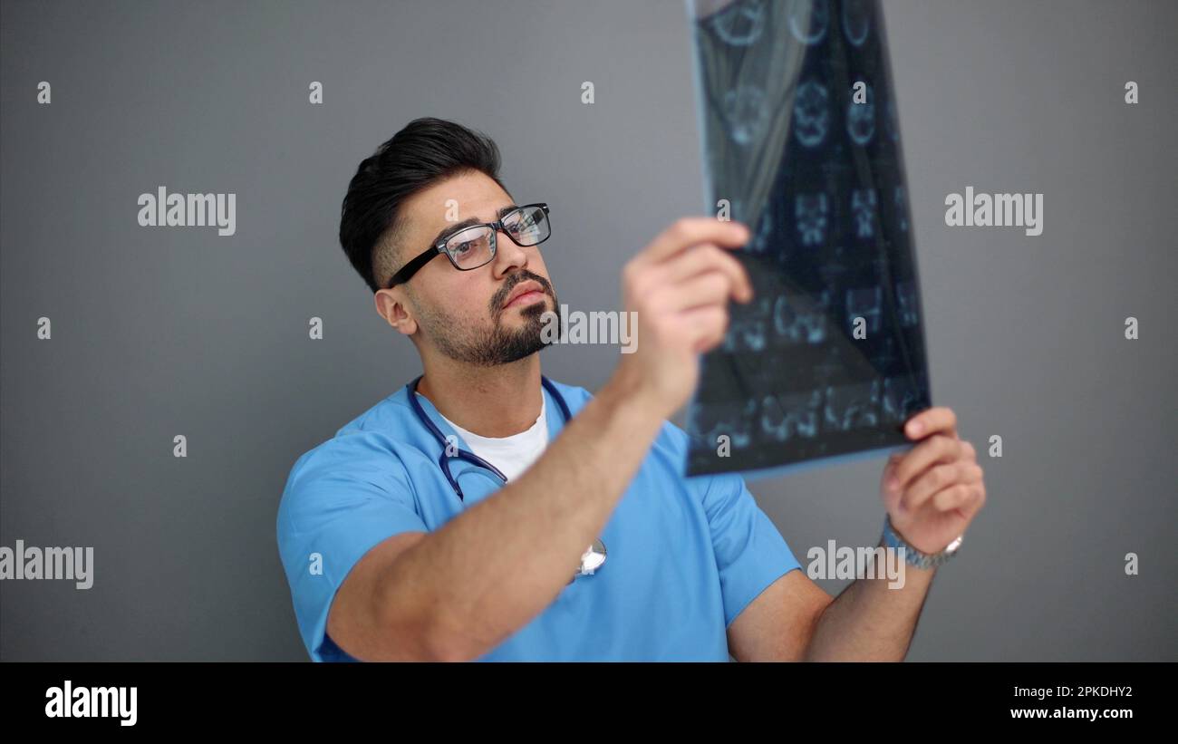 Doctor male looking check up x-ray film in medical laboratory at ...