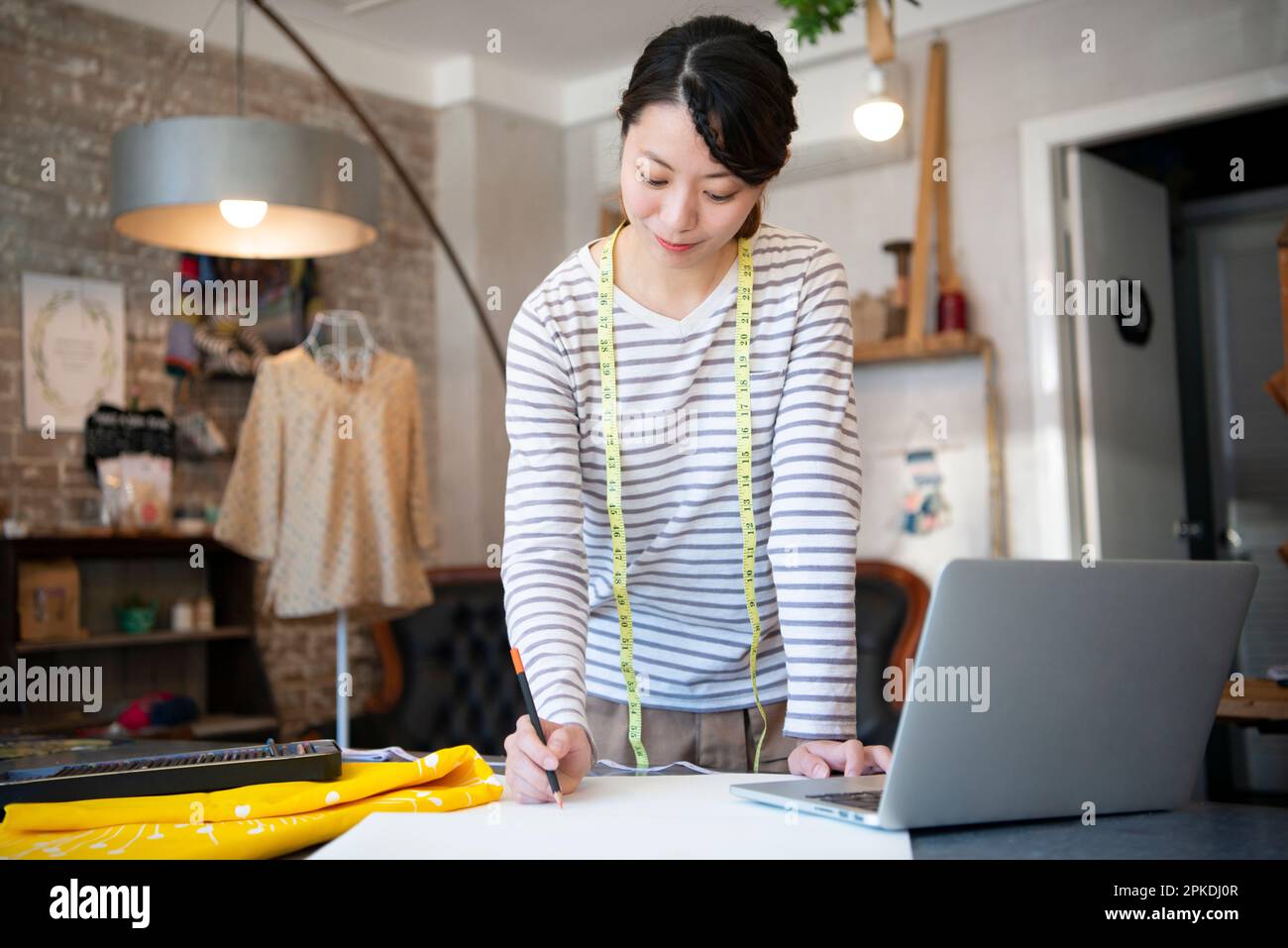 Fashion designer woman at work Stock Photo - Alamy
