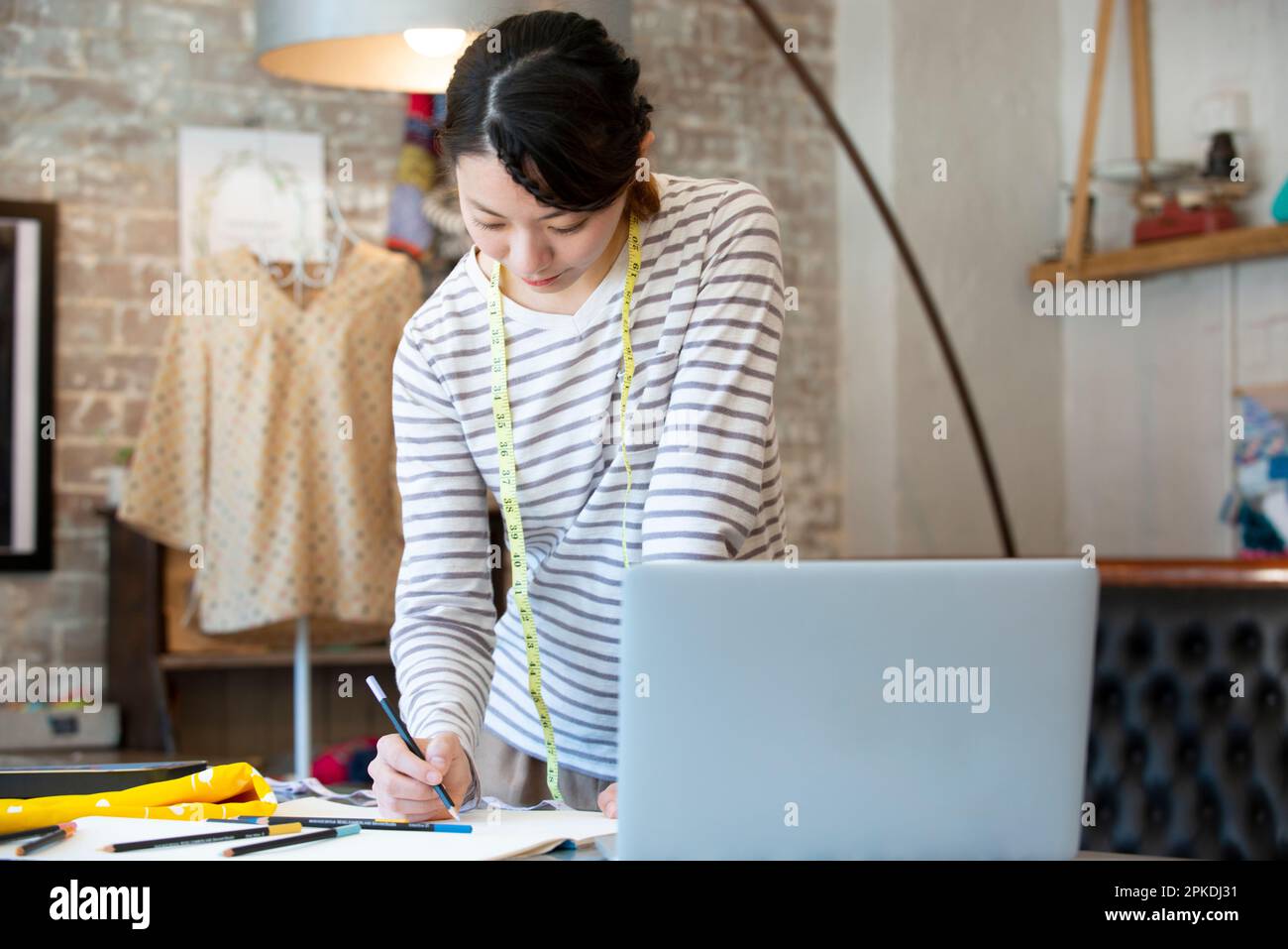 Fashion designer woman at work Stock Photo - Alamy