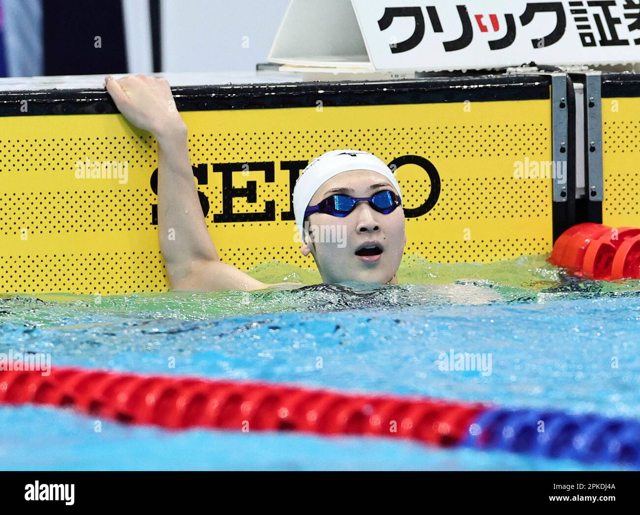 Japanese swimmer Rikako Ikee watches the board after finishing the ...
