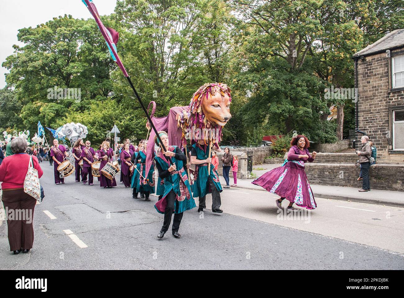 A lion's head and face take part in the street parade held at the ...