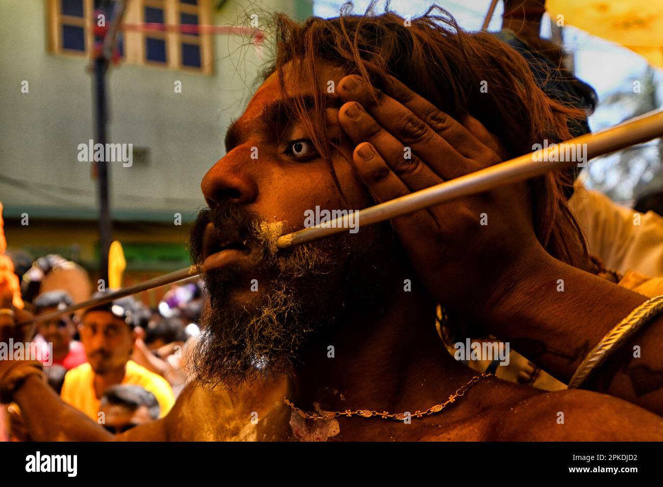Bandel, India. 06th Apr, 2023. A devotee pierces his cheeks with a ...