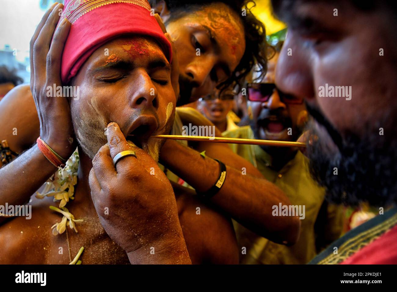 Bandel, India. 06th Apr, 2023. A devotee seen getting pierced by a vel ...