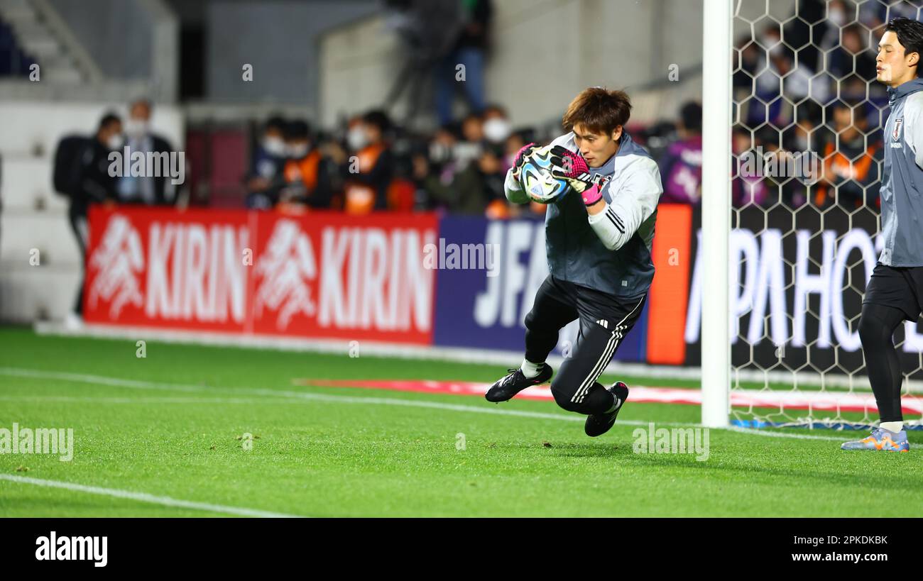 Japan's Keisuke Osako, left, and Kosei Tani warm up before the KIRIN ...