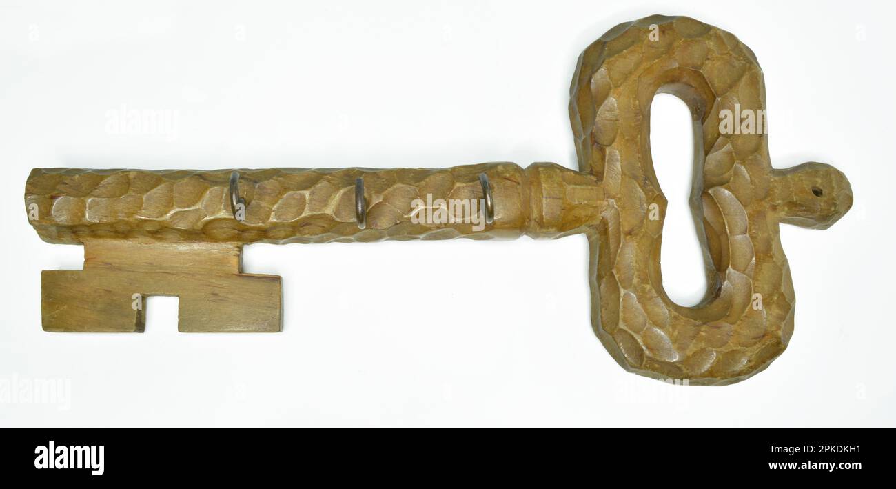 Vintage Decorative wooden key on white background Stock Photo - Alamy