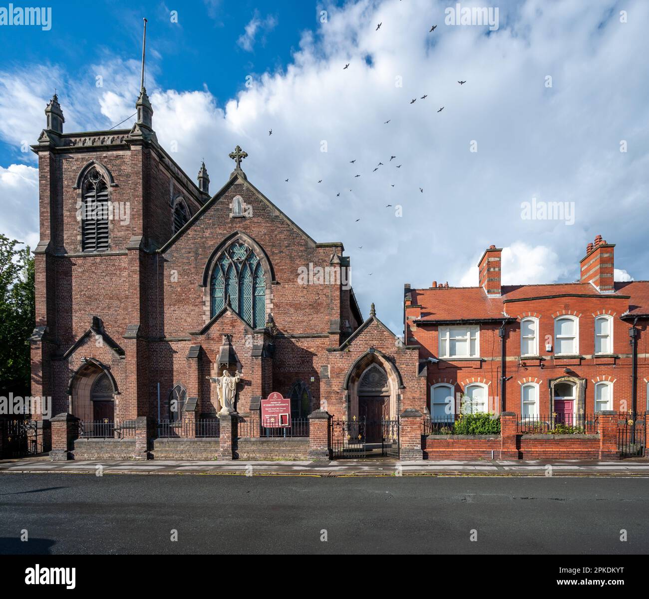 A large 1920s town church, built of red brick in Gothic style in Leigh ...