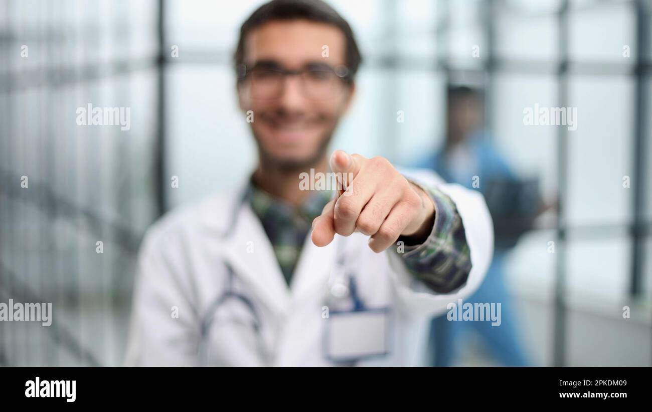 The doctor makes a positive sign for medicine with his finger Stock ...
