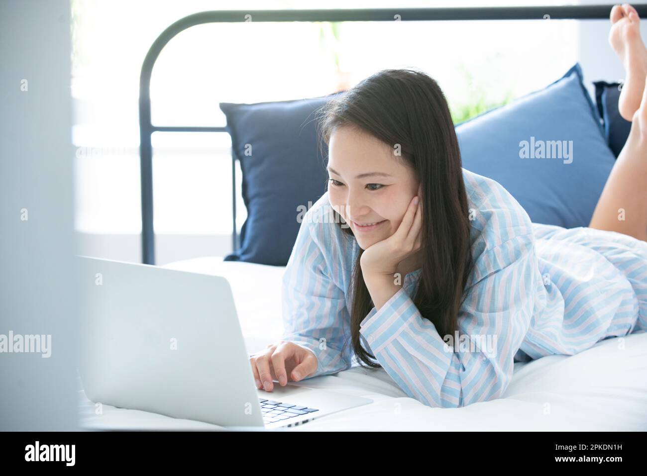 Pajamas laptop computer hi-res stock photography and images - Alamy