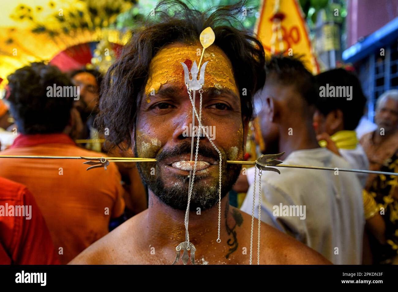Bandel, India. 06th Apr, 2023. A devotee is seen with their mouth ...