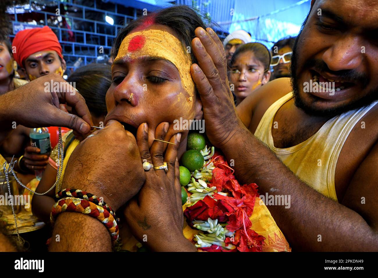 Bandel, India. 06th Apr, 2023. A woman devotee seen getting pierced by ...