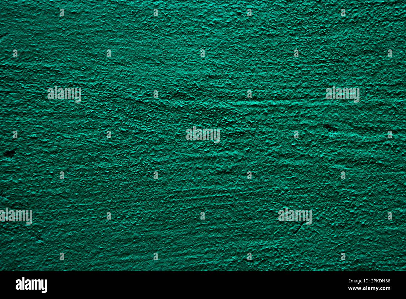 Teal colored abstract wall background with textures of different shades ...