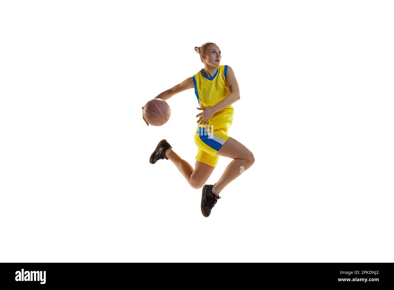 Match preparation. Young sportive girl, basketball player in motion ...