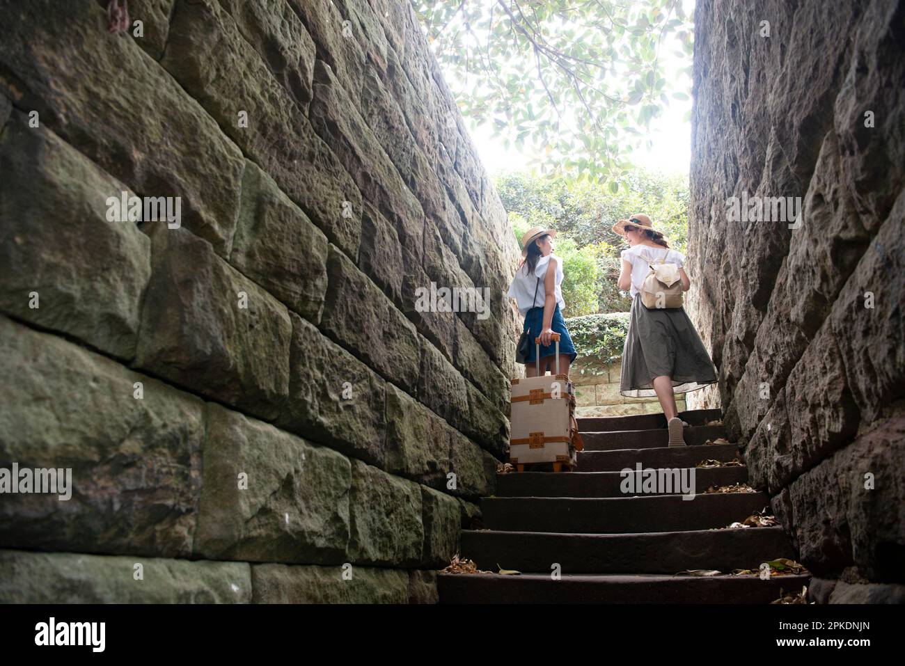 Women climbing stairs hi-res stock photography and images - Alamy