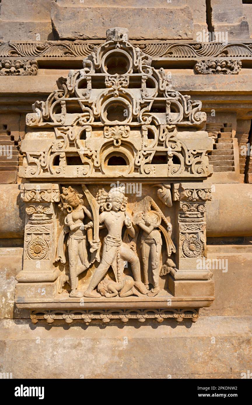 Carved stone idols on the outer wall of The Harshat Mata Temple, a ...