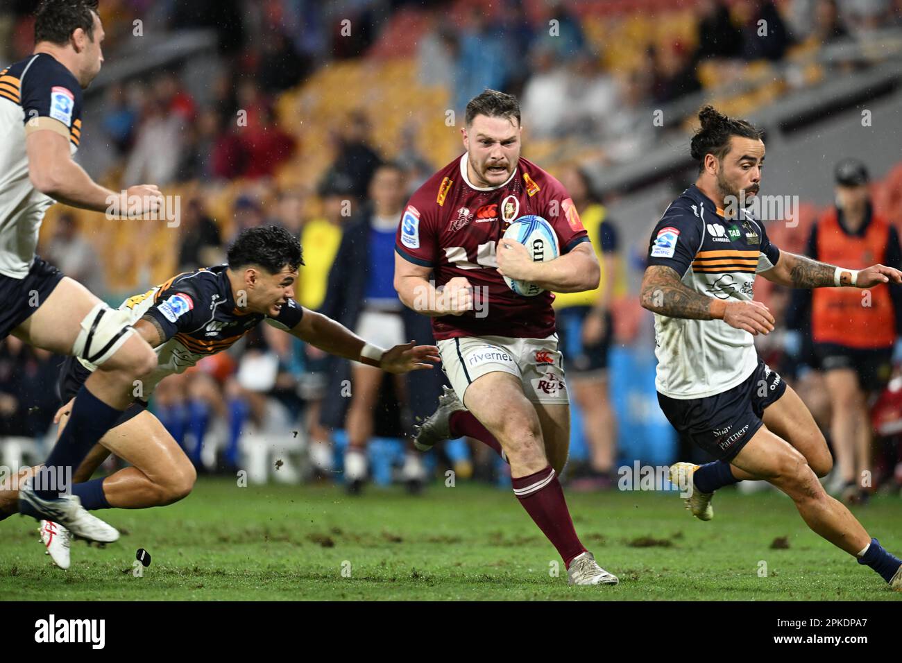 Matt Faessler (centre) of the Reds in action during the Super Rugby ...