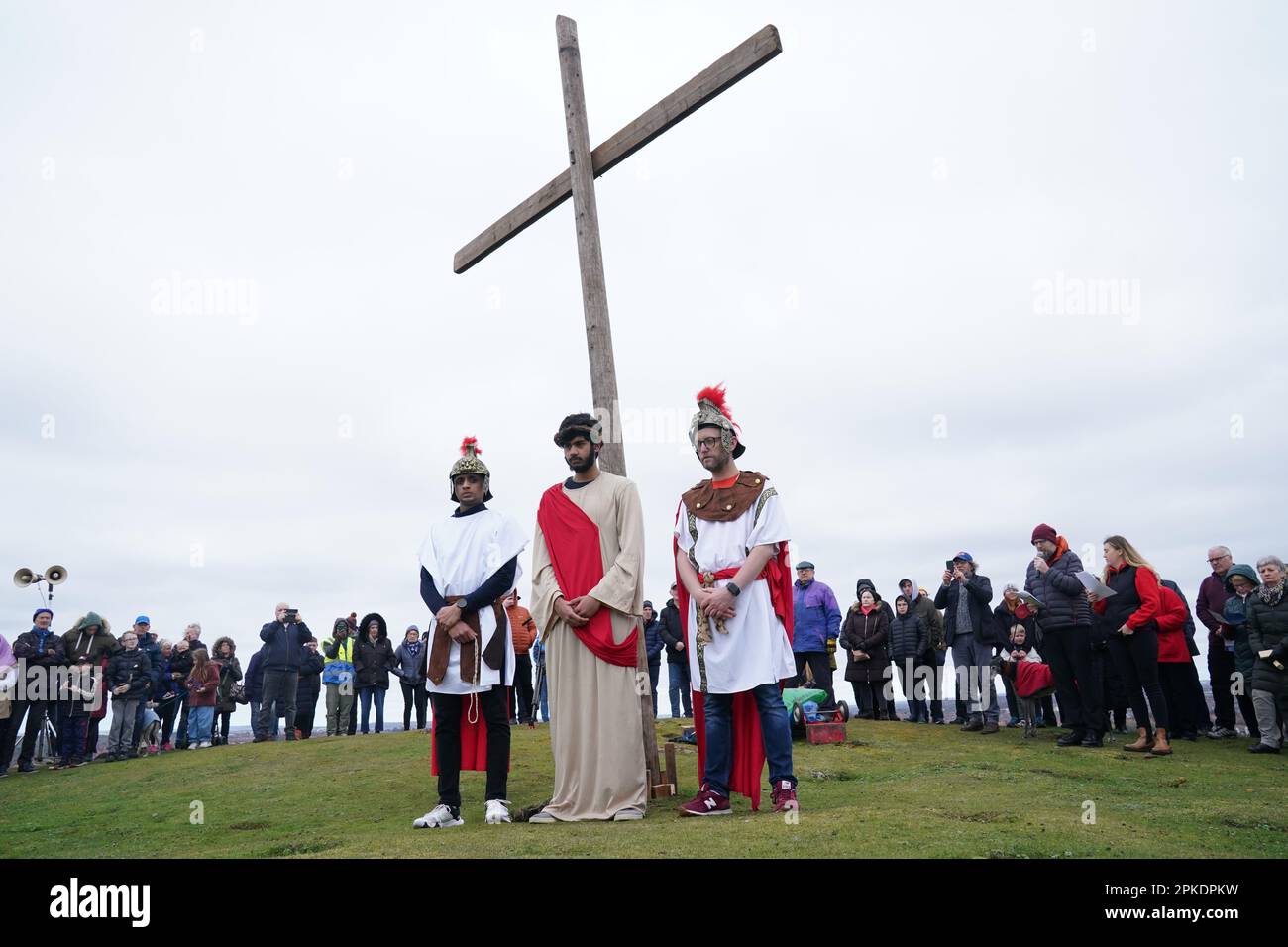 People watch a Good Friday Walk of Witness in Sunderland which returns ...