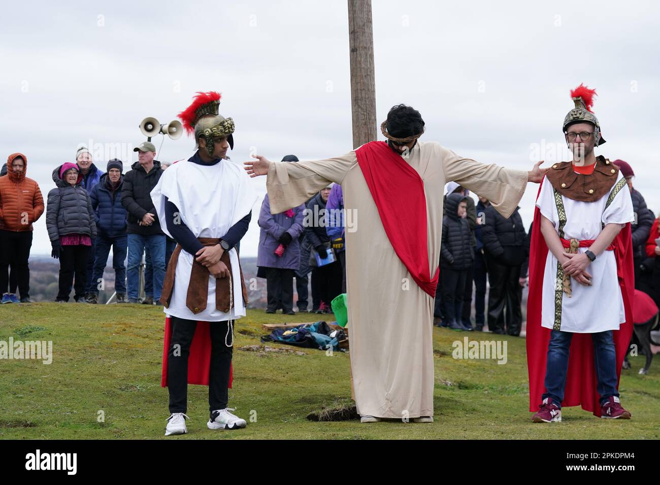 People watch a Good Friday Walk of Witness in Sunderland which returns ...
