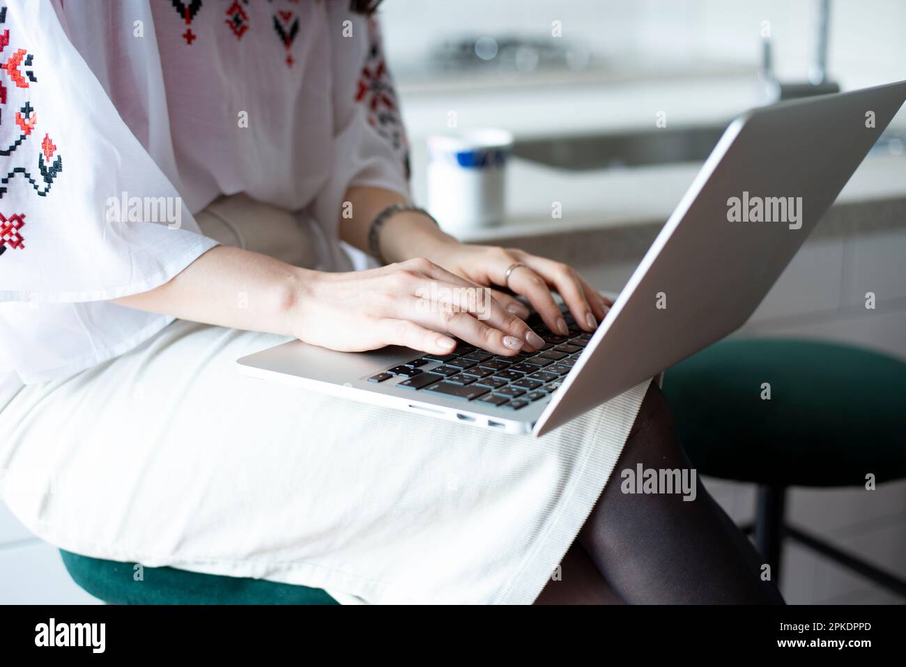 Woman's hand touching computer Stock Photo - Alamy
