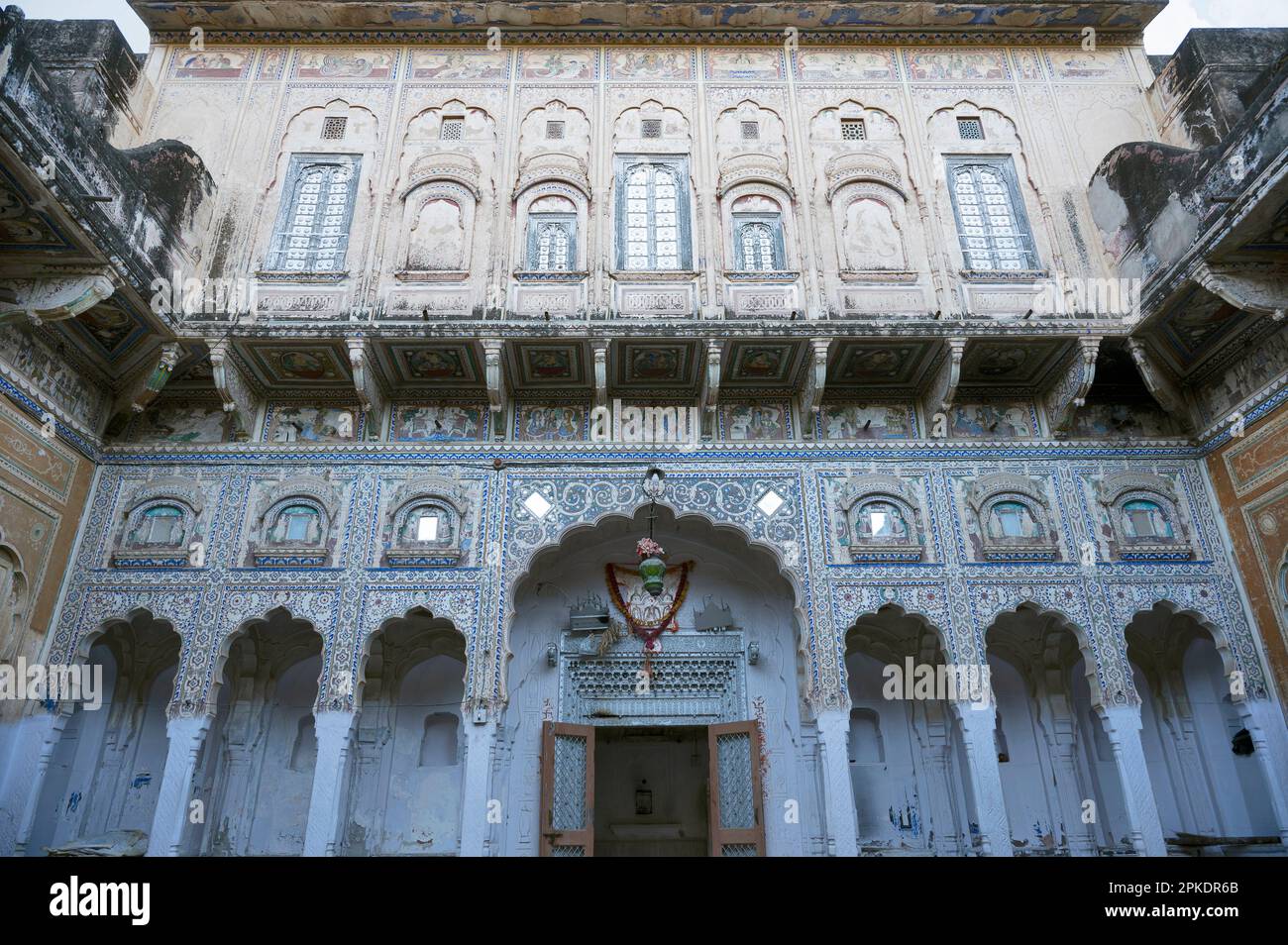 Colourful paintings and mirror work at the entrance gate of an old ...