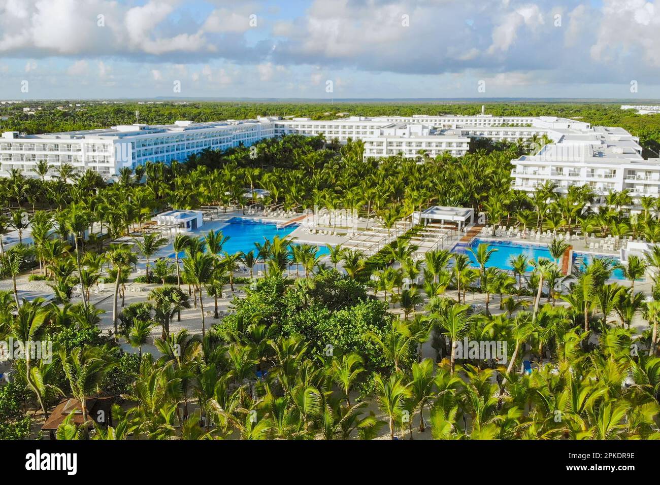 Luxury resort. Aerial view hotel surrounding territory with ocean coast ...