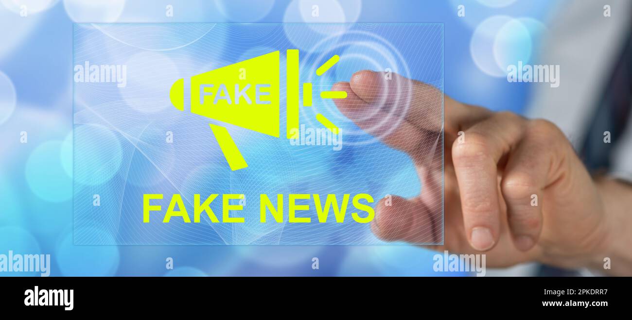 Man touching a fake news concept on a touch screen with his finger ...