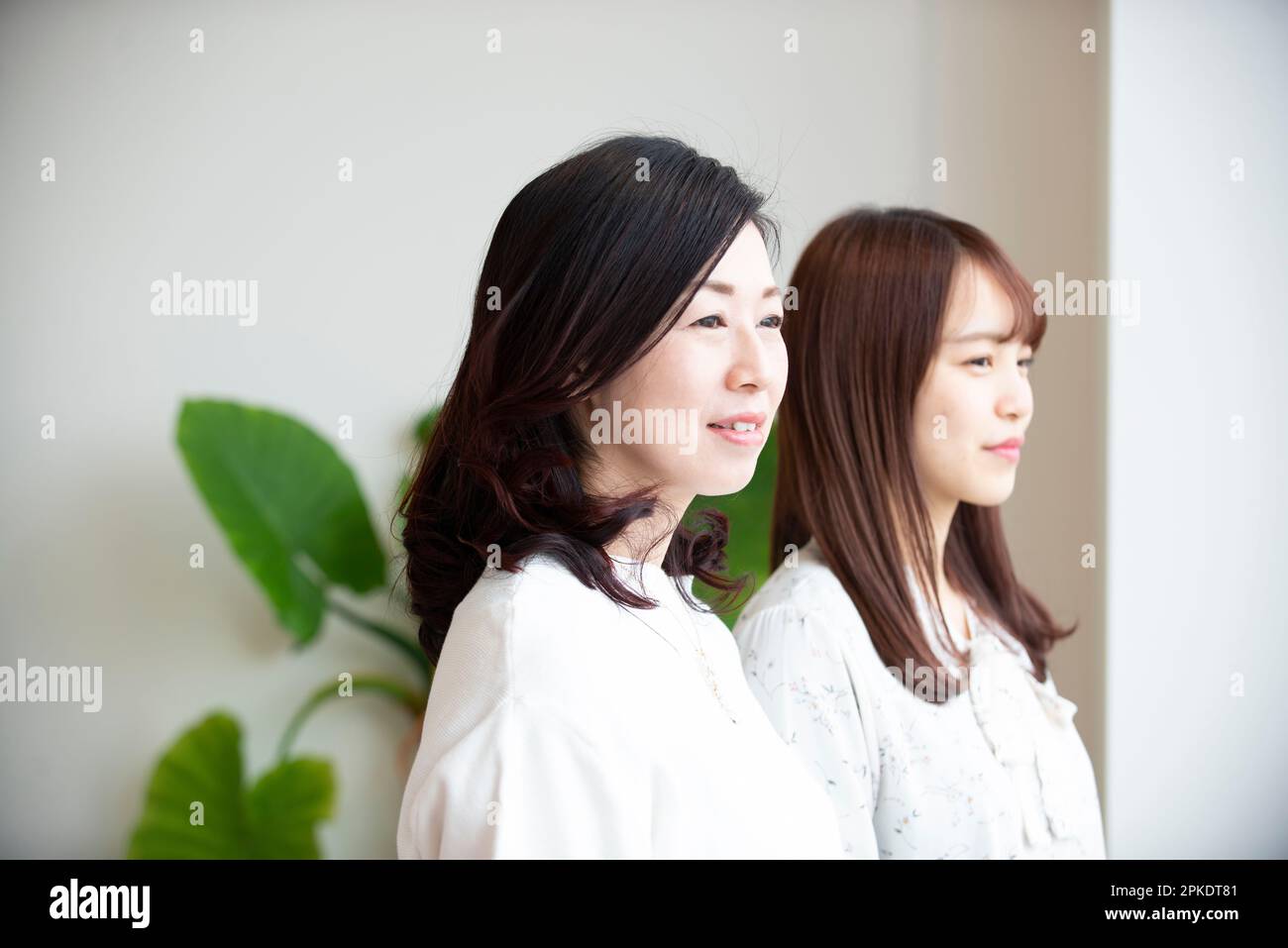 Parent and child looking out the window Stock Photo - Alamy Parent and child looking out the window Stock Photo - Alamy