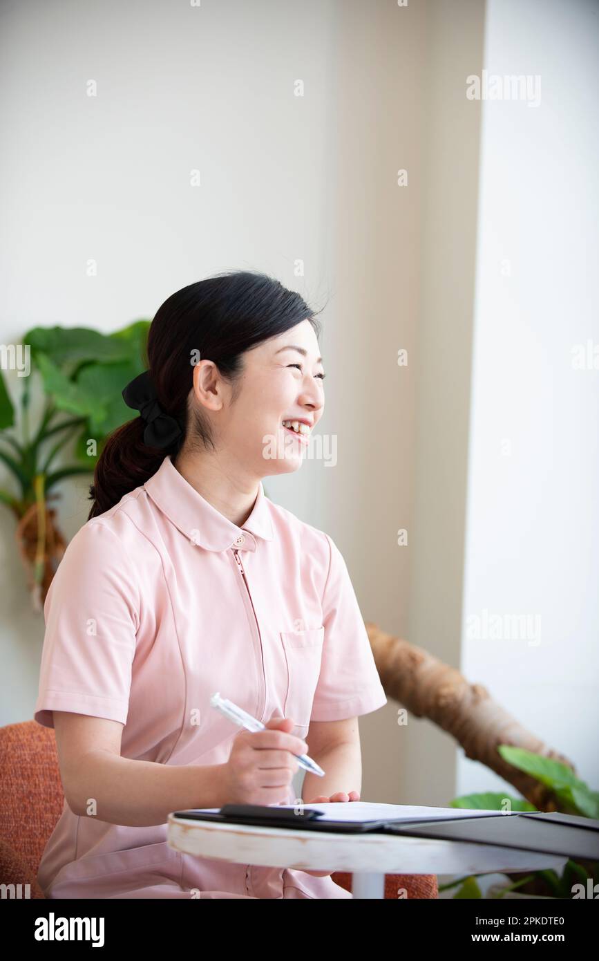 Woman in counseling Stock Photo - Alamy