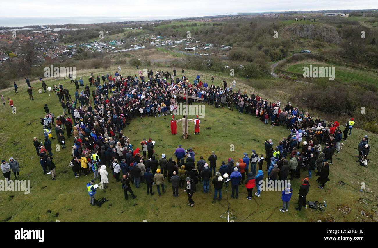 People watch a Good Friday Walk of Witness in Sunderland which returns ...