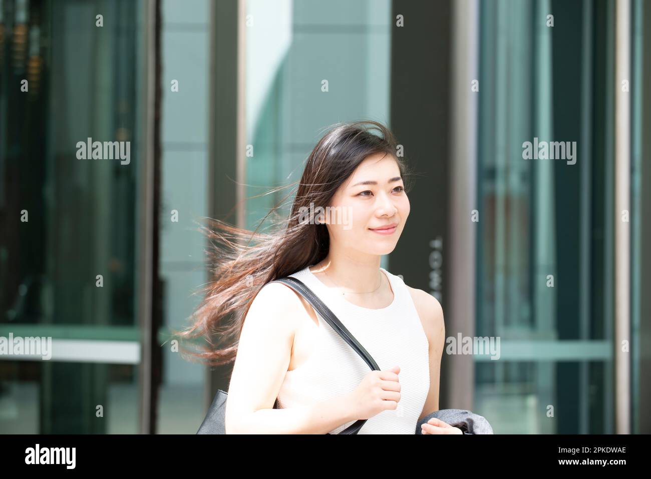 Woman walking outside hi-res stock photography and images - Alamy