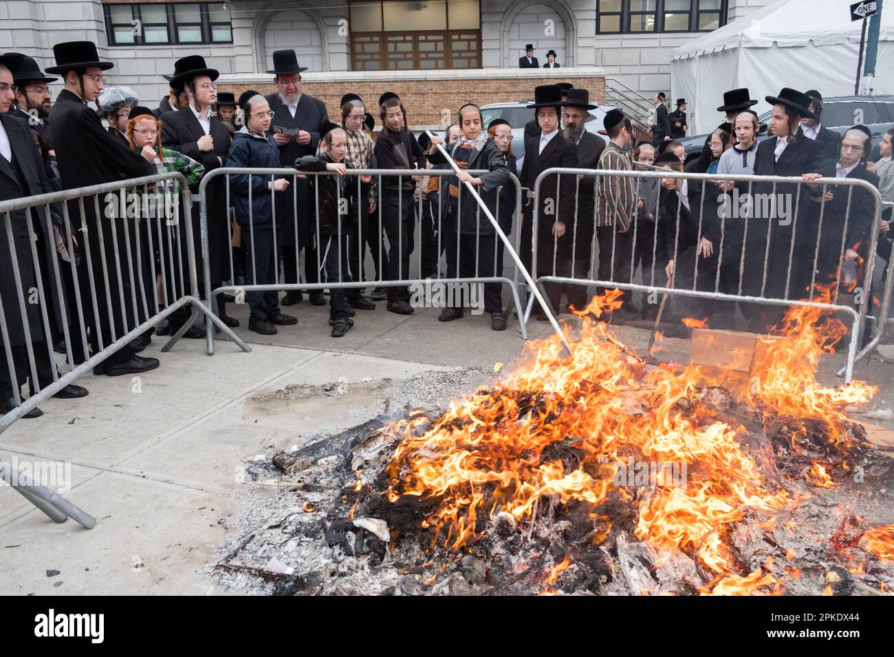 Hours before Passover begins, Hasidic men & boys burn their remaining ...