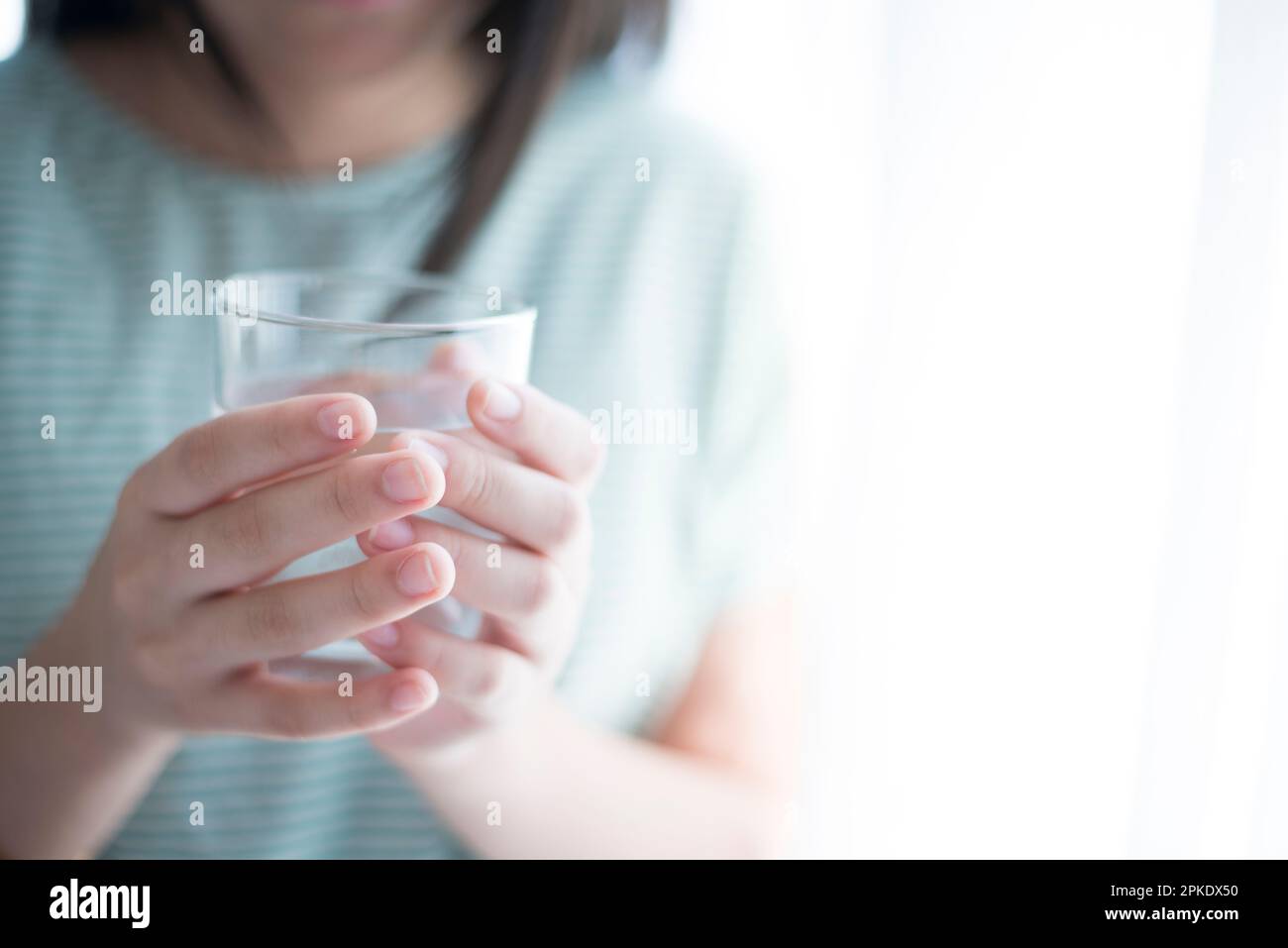 Girl entering the water hi-res stock photography and images - Alamy