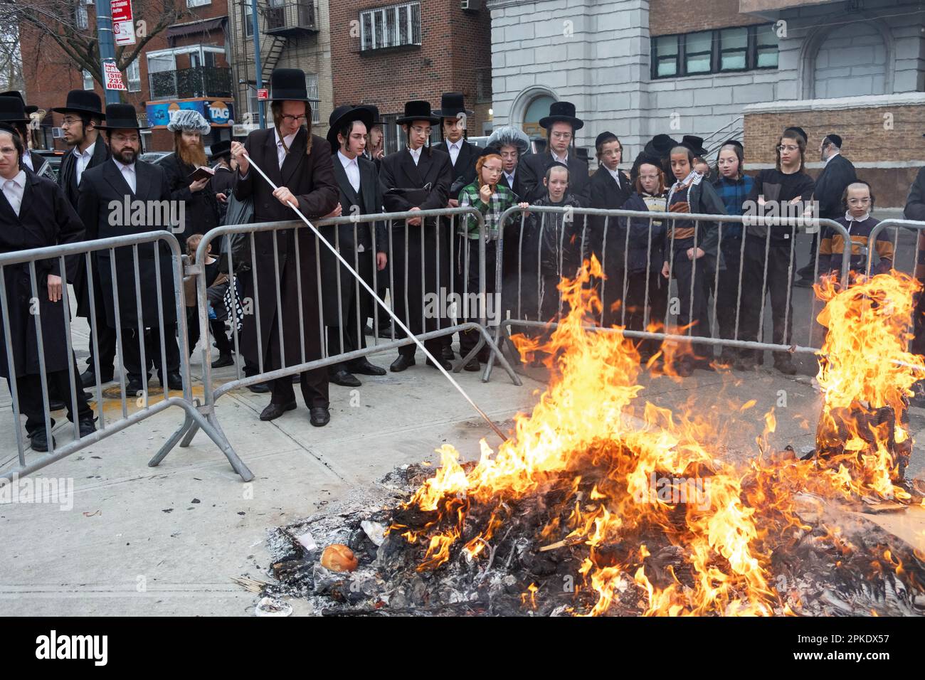 Hours before Passover begins, Hasidic men & boys burn their remaining ...