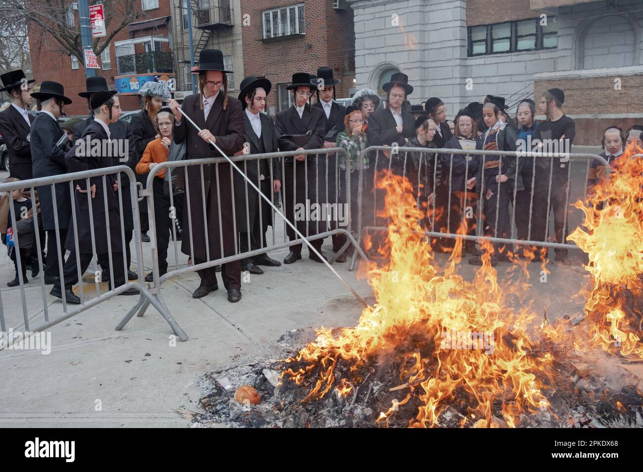 On the morning before Passover a family prays together at a bonfire ...