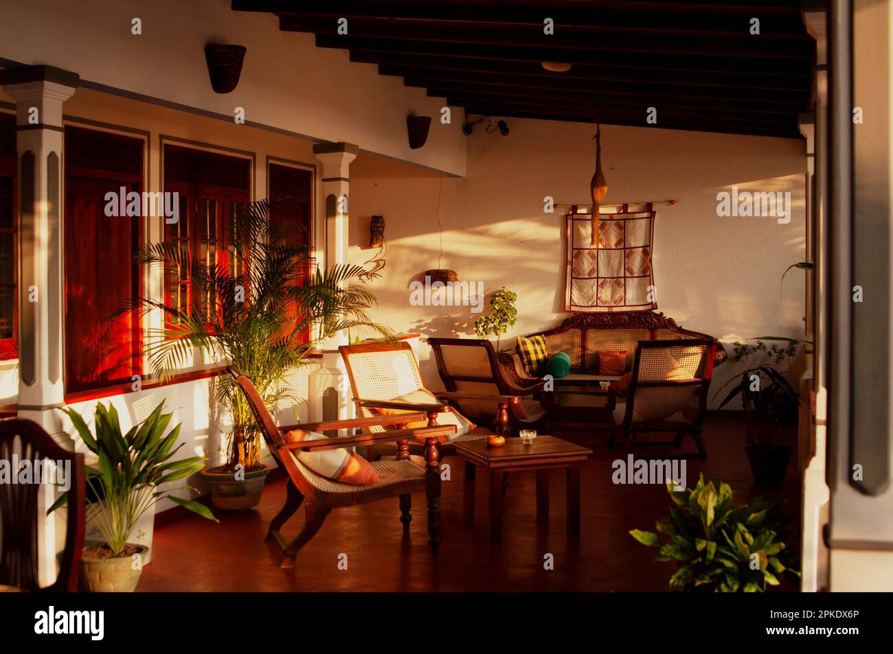 Veranda at sunset Stock Photo - Alamy