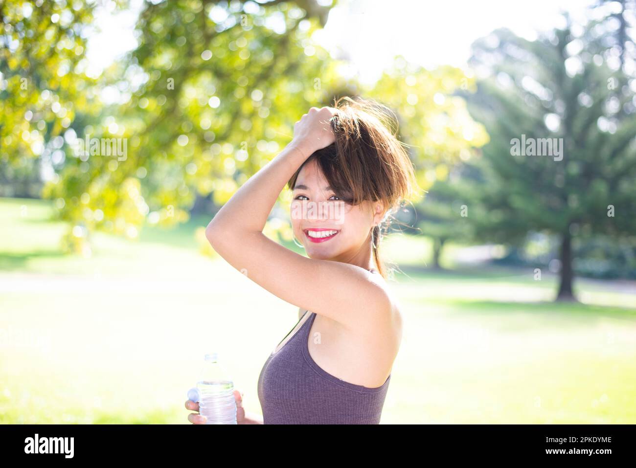Asian woman in sports top hi-res stock photography and images - Alamy