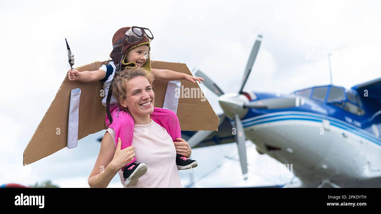 A loving Caucasian woman is playing with her little daughter in ...