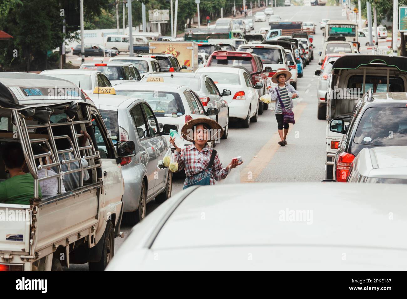 Yangon, Myanmar - March 25, 2023 : Myanmar man walking down on the ...