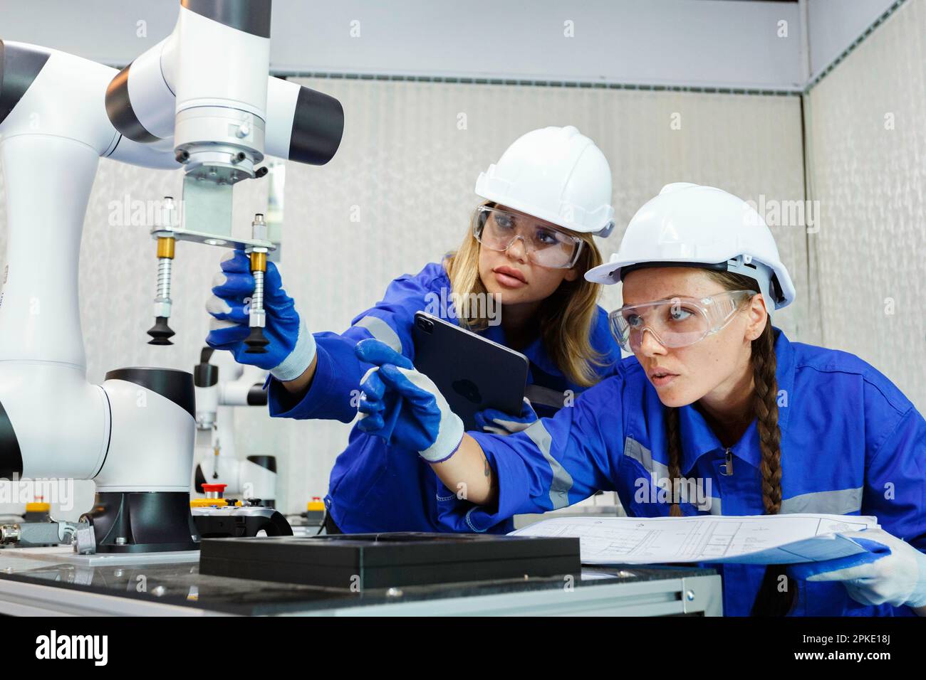 female automation machine engineer student study and inspection control ...
