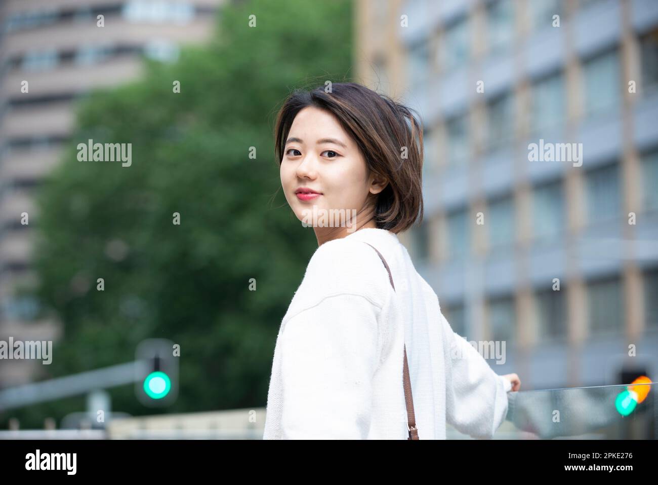 Beautiful asian woman turning hi-res stock photography and images - Alamy