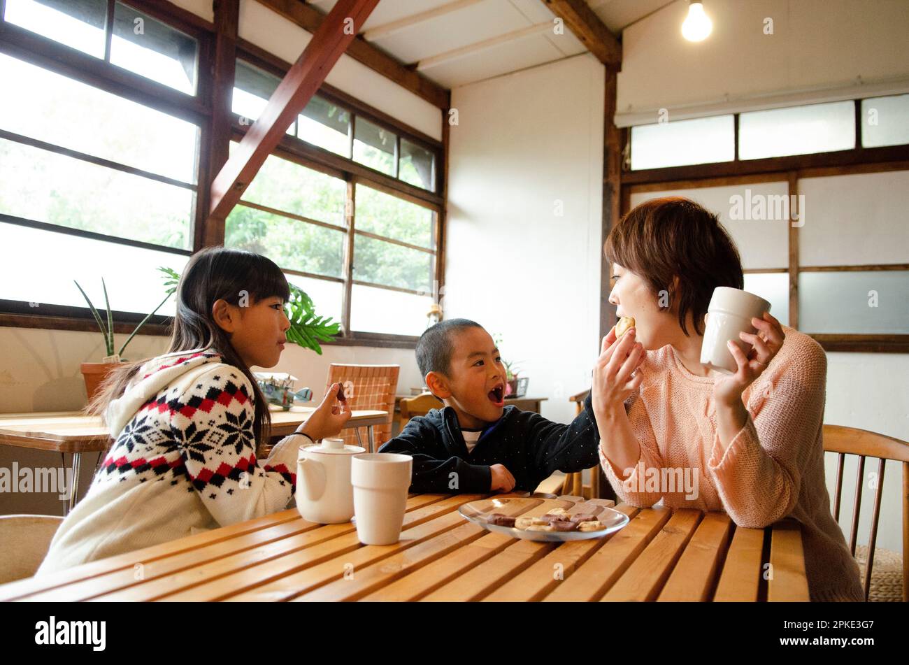 Happy asian mother son eating hi-res stock photography and images - Alamy