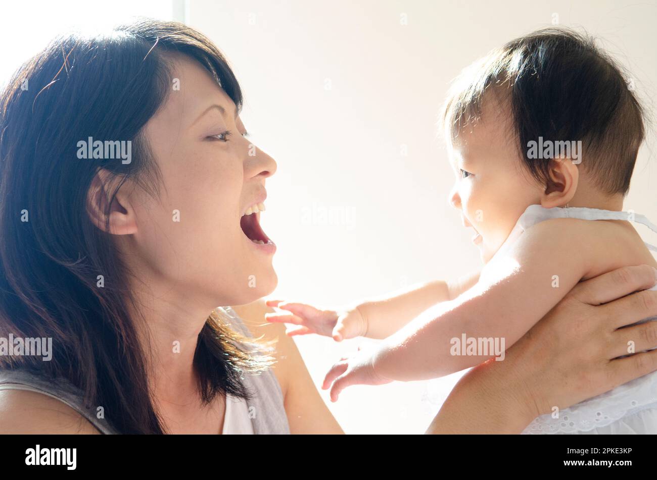 Mother nursing her baby Stock Photo - Alamy