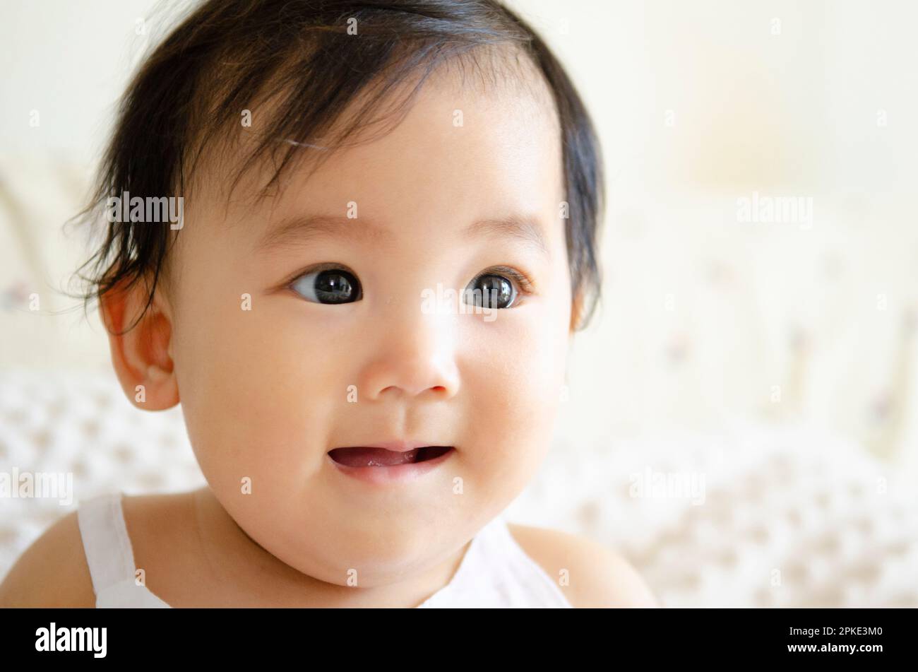 Asian baby smile hi-res stock photography and images - Alamy